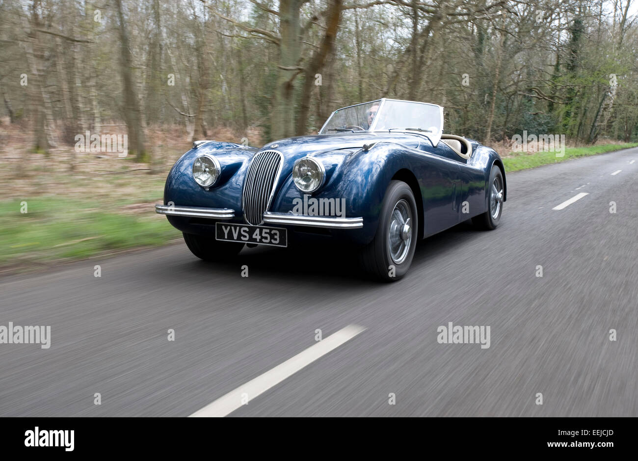Jaguar XK120 classic British open sports car driving Stock Photo - Alamy