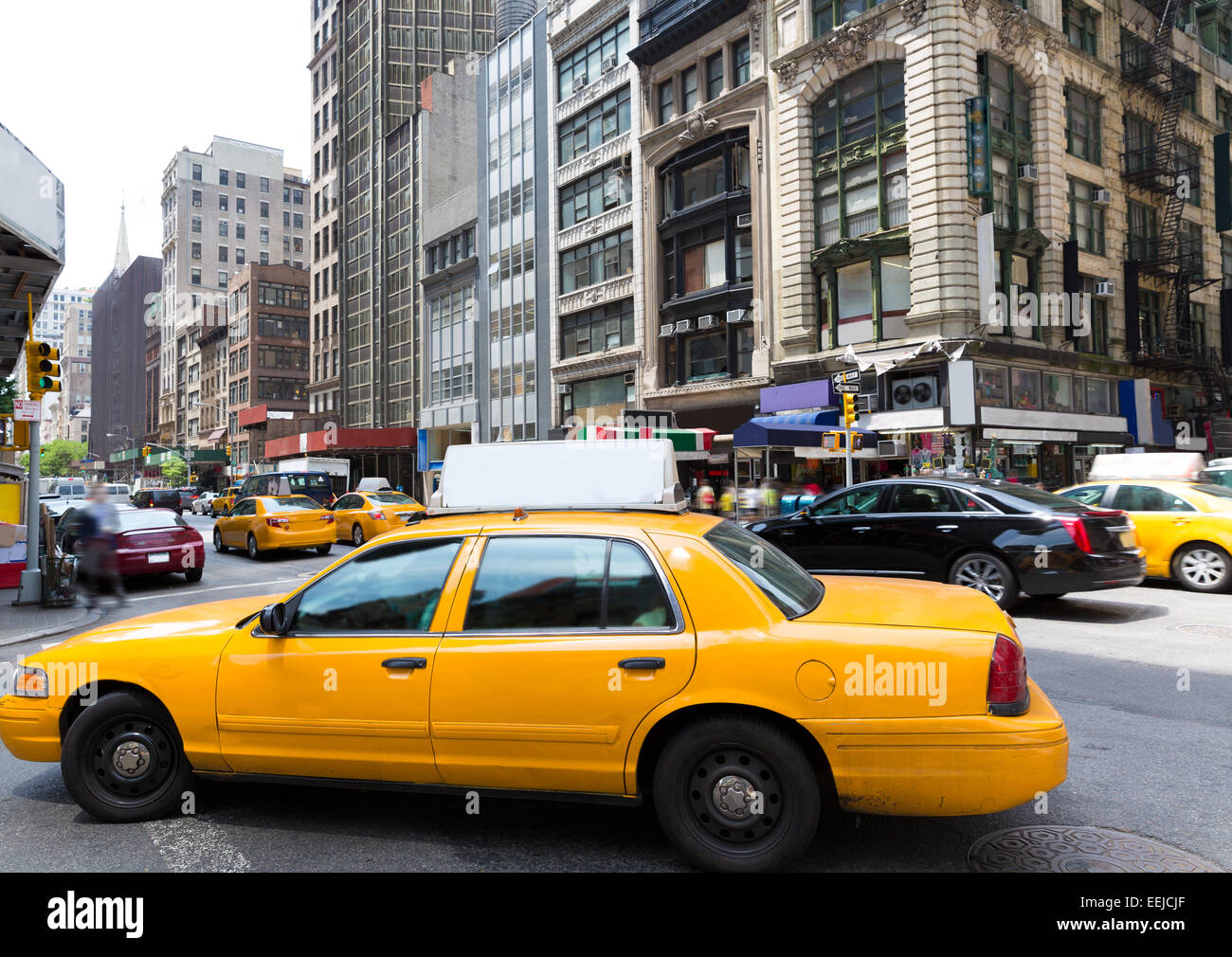 New York city Manhattan Fifth Avenue 5th Av yellow taxi cab US Stock ...
