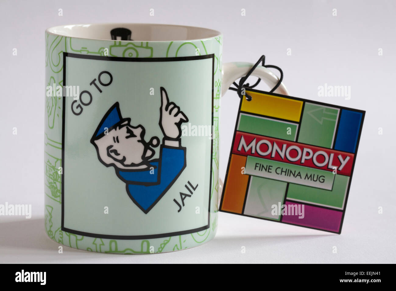 Monopoly fine china mug with label tag - Go to jail isolated on white ...