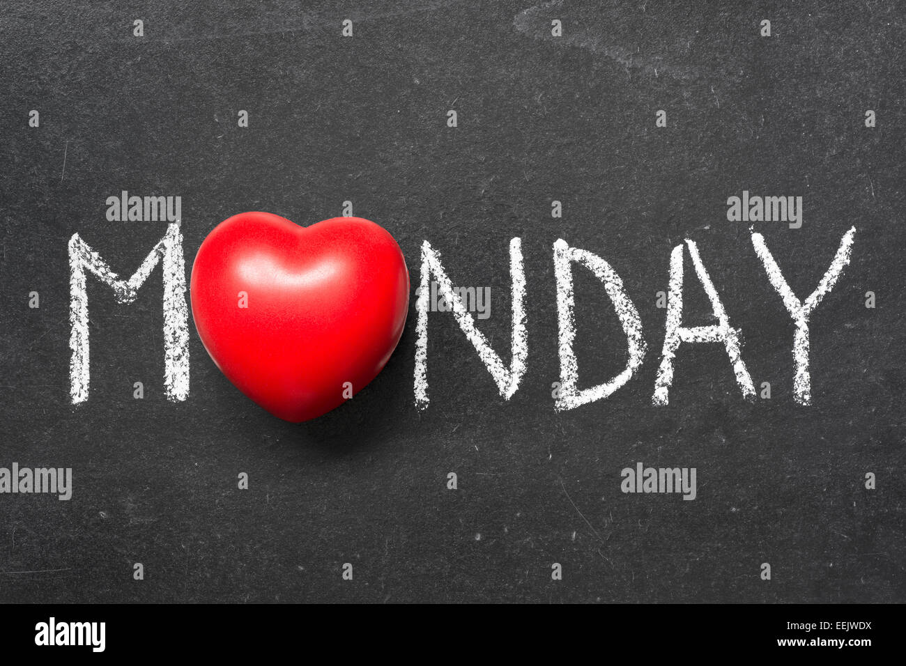 Monday word handwritten on chalkboard with heart symbol instead of O ...