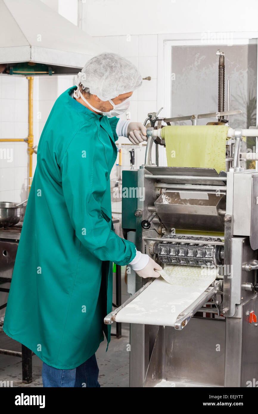 Pasta production work ravioli machine hi-res stock photography and ...