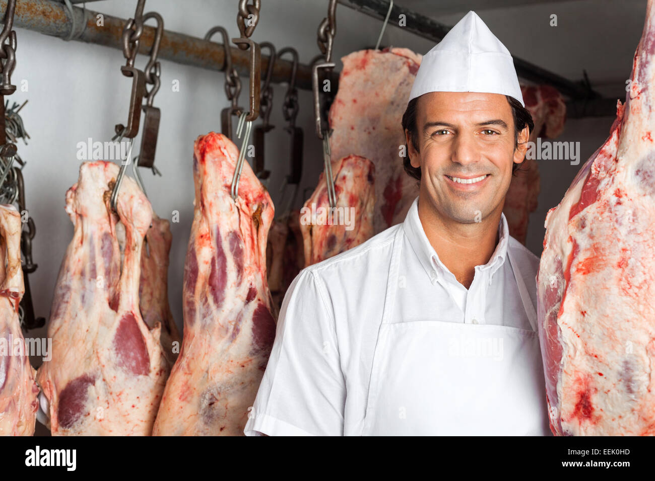 Butcher standing in meat hi-res stock photography and images - Alamy
