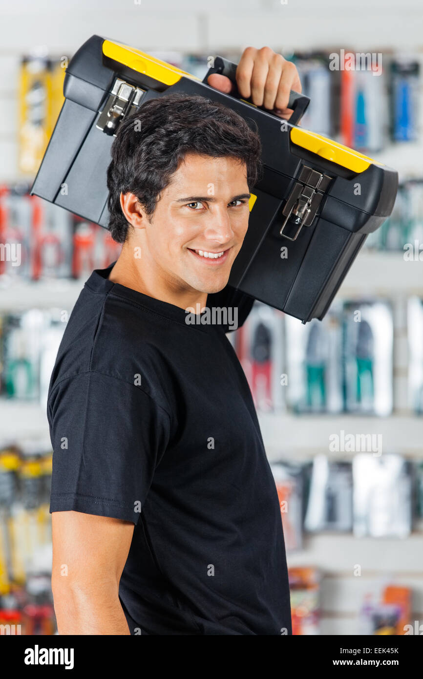 Man carrying tool box on hi-res stock photography and images - Alamy