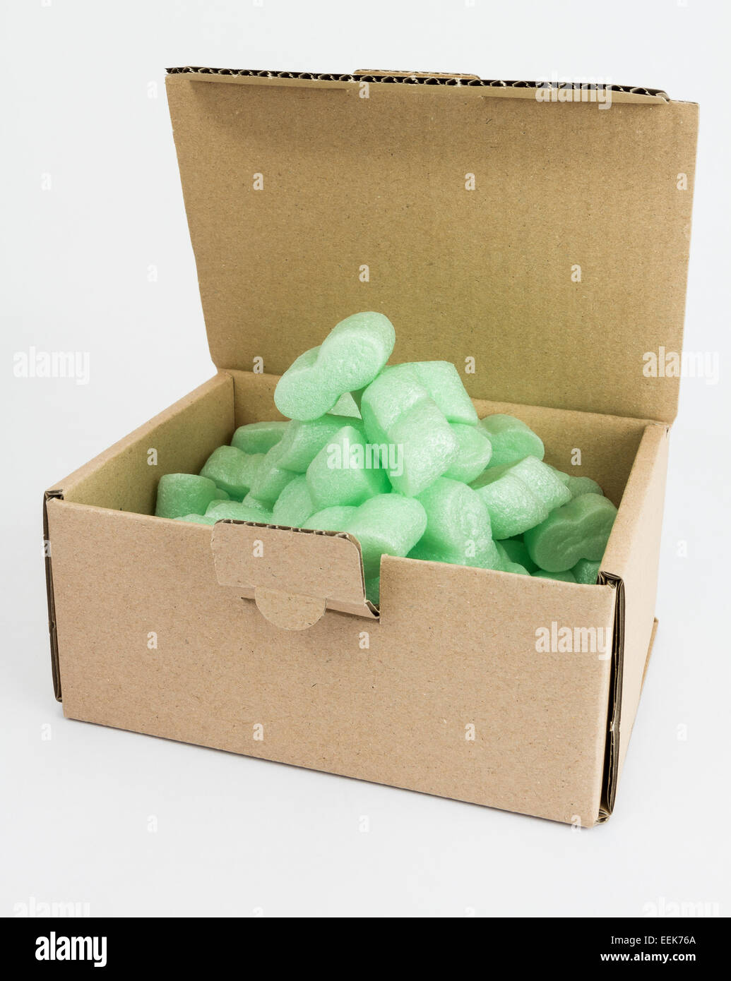 open packaging box with green foam on neutral grey background Stock ...
