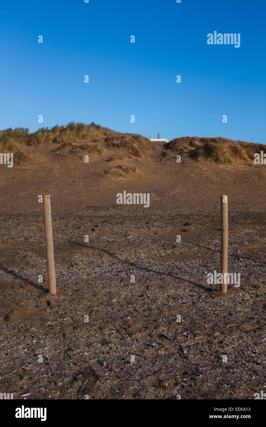 Posts on the beach in St Annes Lancashire. Designed to widen the sand ...