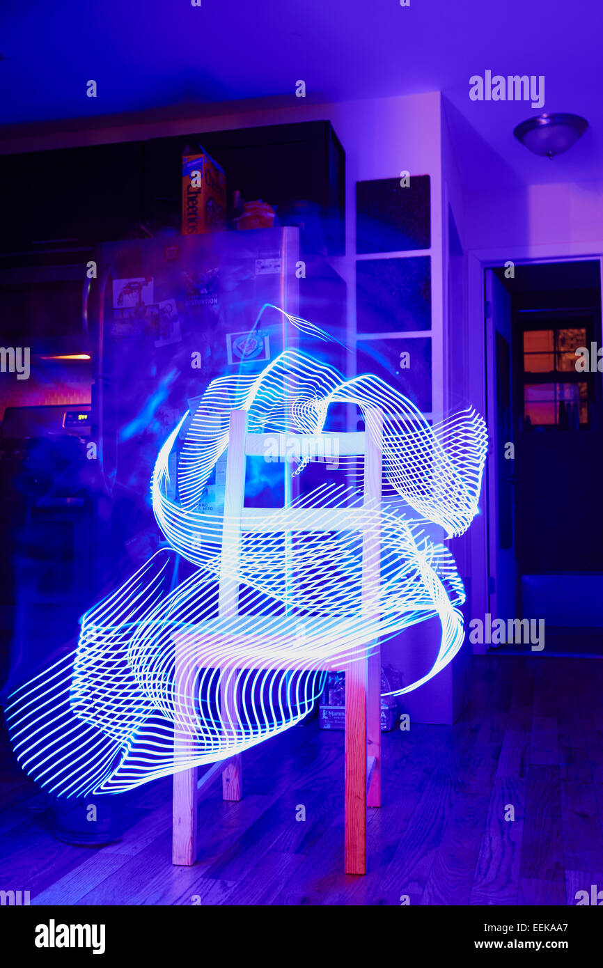 Whimsical light painting forms with LED light stick Stock Photo - Alamy