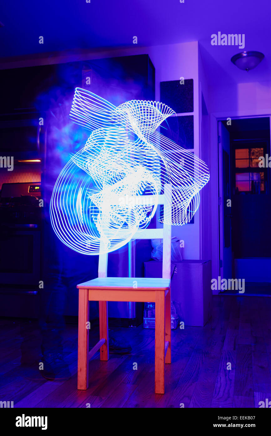 Whimsical light painting forms with LED light stick Stock Photo - Alamy