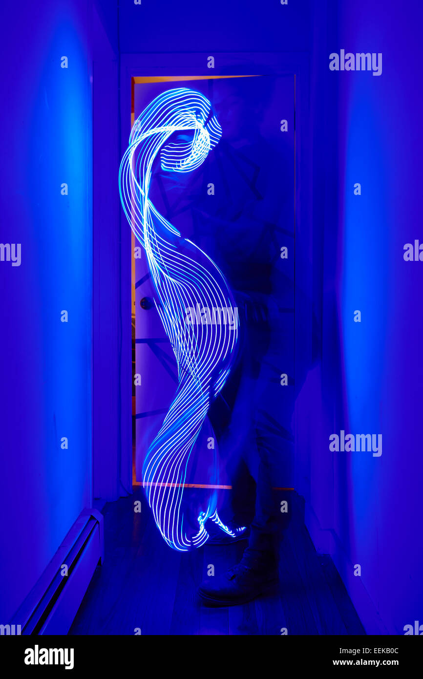 Whimsical light painting forms with LED light stick Stock Photo - Alamy
