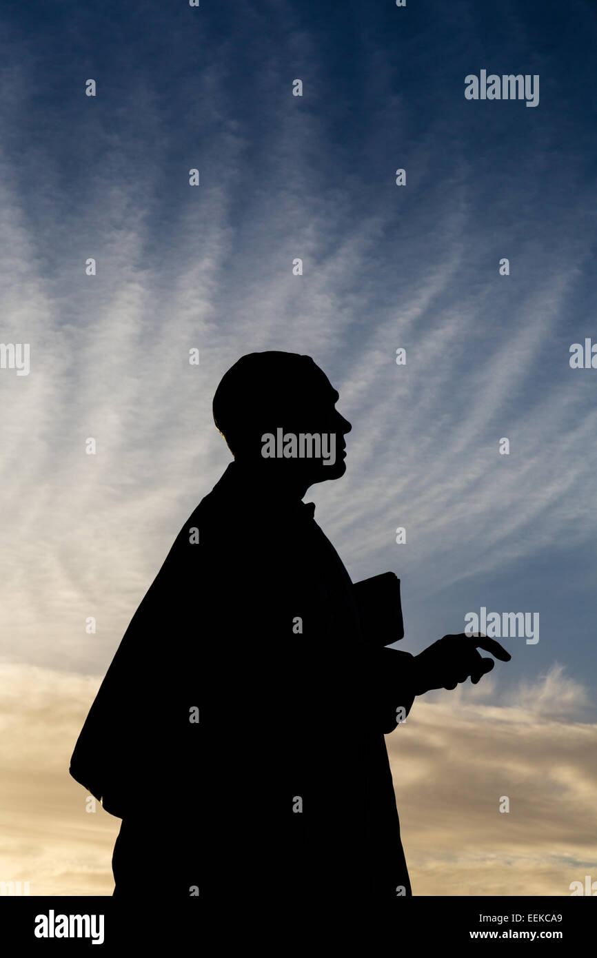 Silhouette of the Thomas Charles Edwards statue at the Old College ...