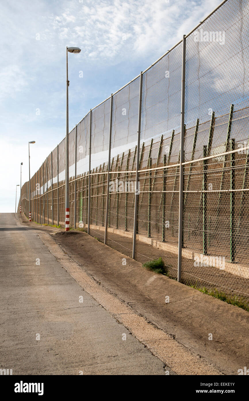 High security fences separate the Spanish exclave of Melilla, Spain ...