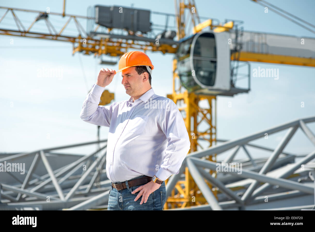 A foreman at the construction supervising the project Stock Photo - Alamy