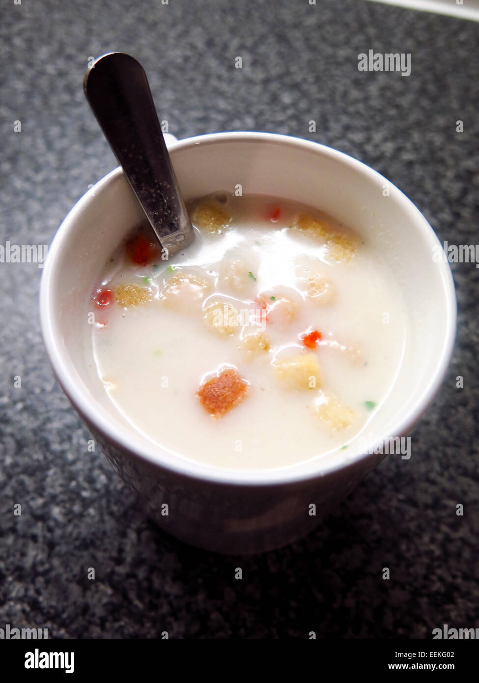 Cup a soup in mug with spoon Stock Photo - Alamy