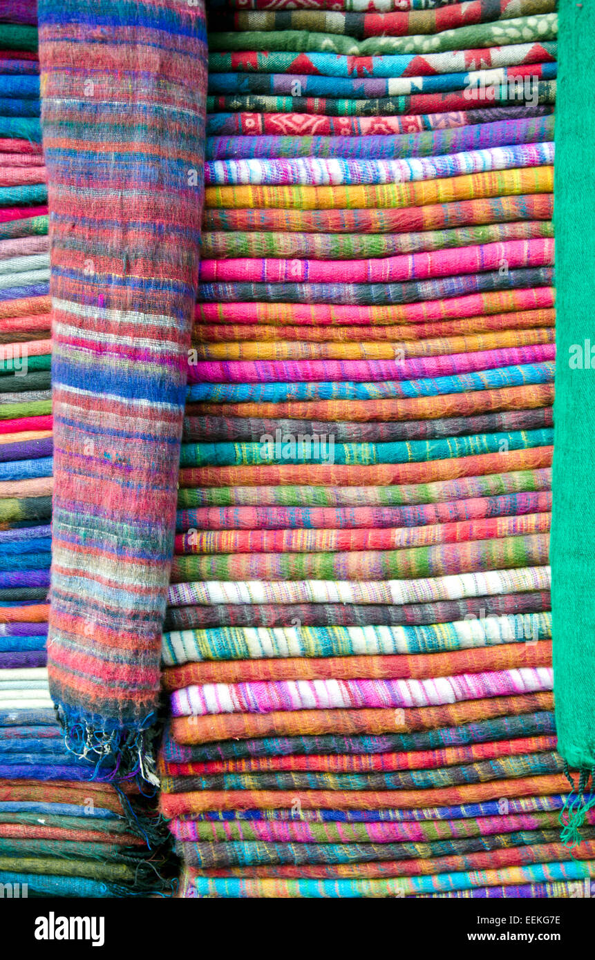 Colorful stacked various fabric cloth in big market, Kathmandu, Nepal ...
