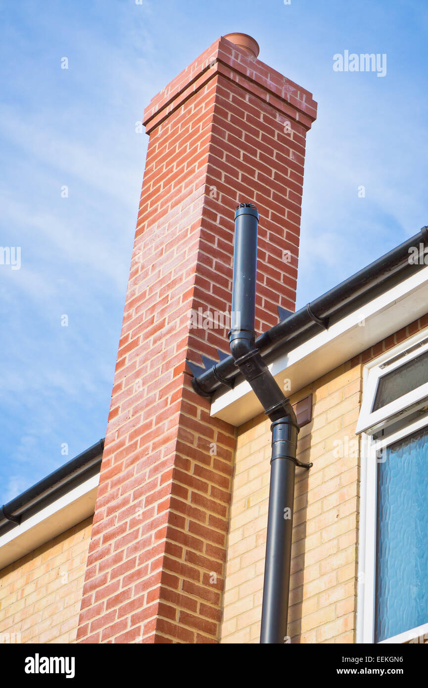 A modern chimey on a house Stock Photo - Alamy