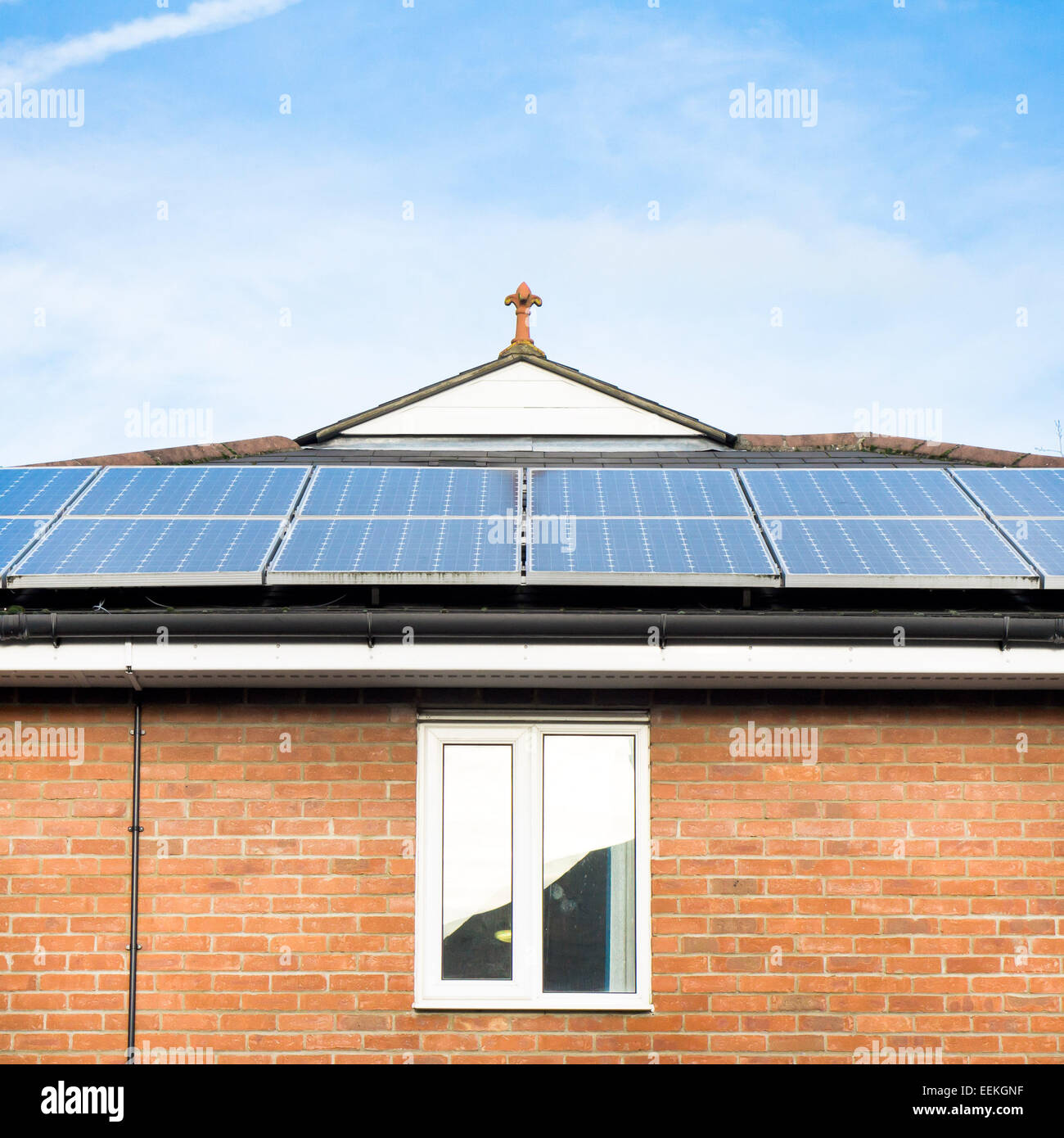 A home in England with solar panels on the roof Stock Photo - Alamy