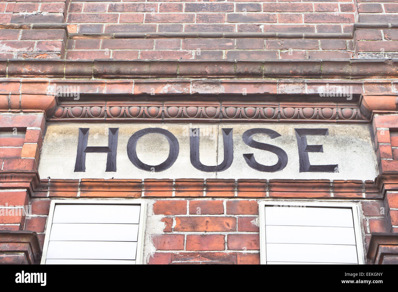 Engraved word house on a victorian red brick building in England Stock ...