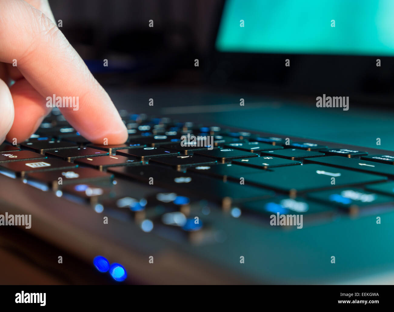 Typing on keyboard blue light hi-res stock photography and images - Alamy