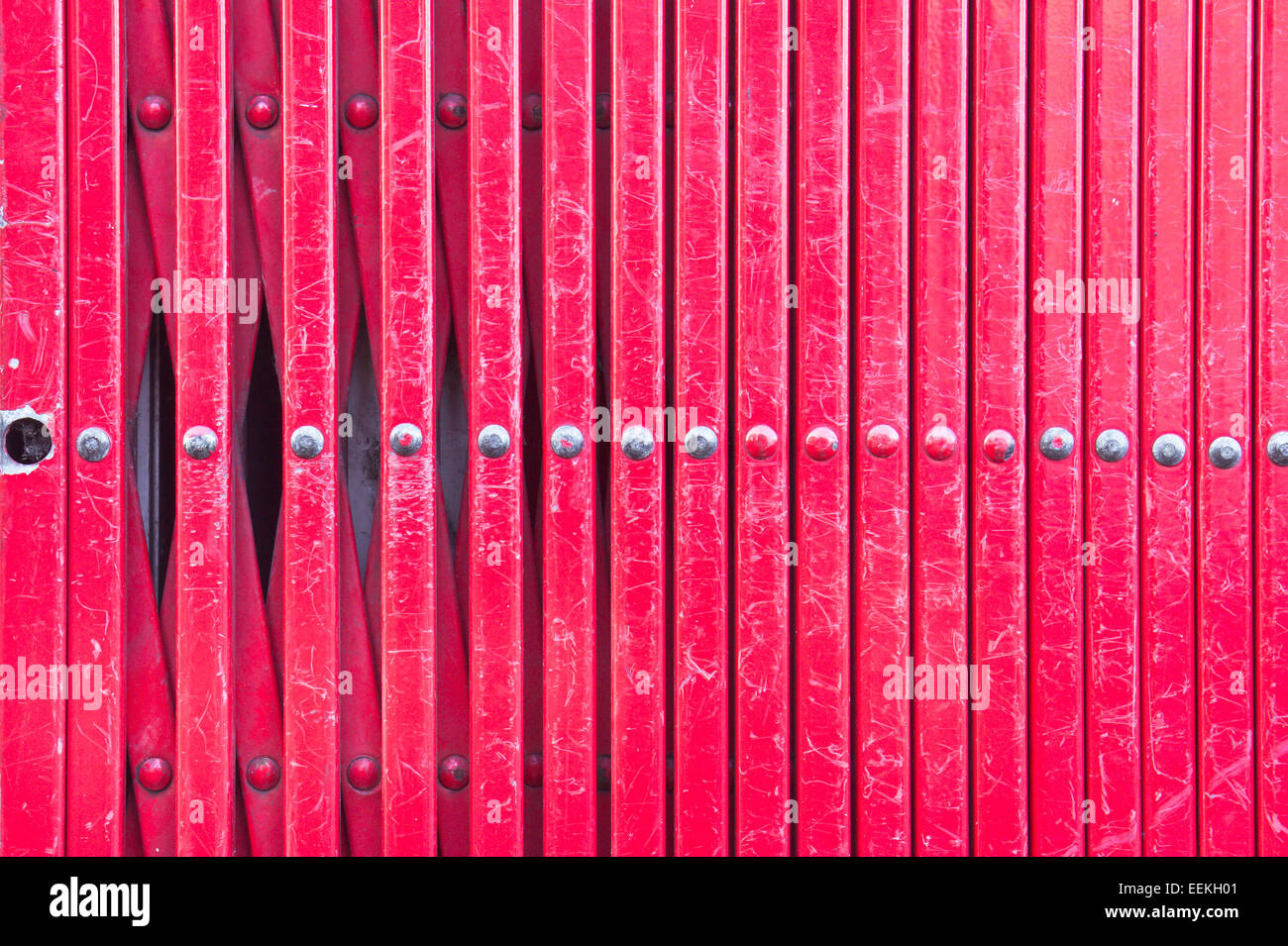 Close up expanding red metal bars as an abstract Stock Photo - Alamy