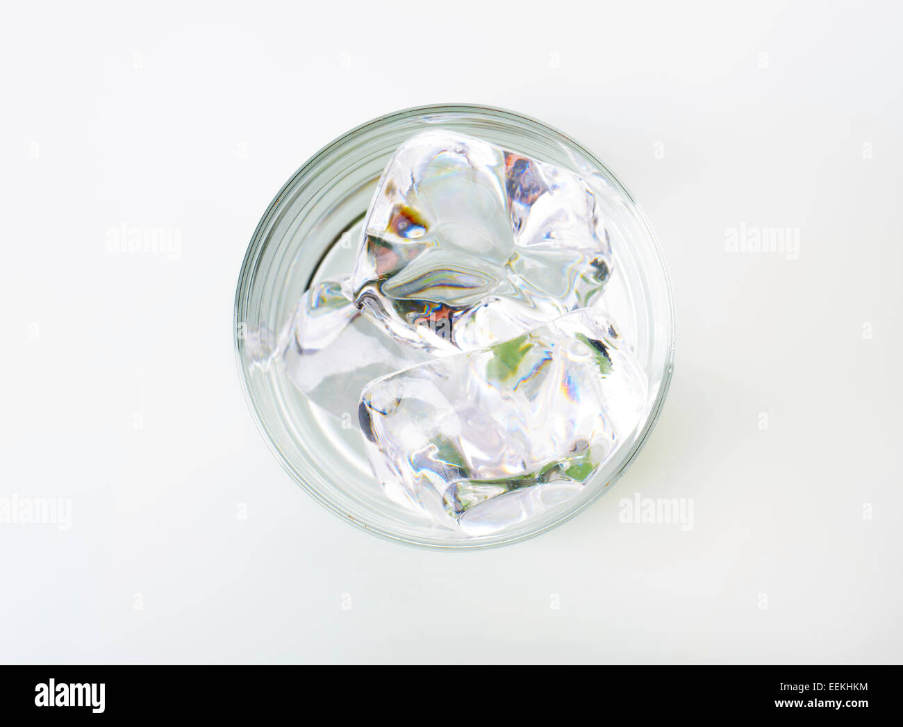 Ice in a tumbler glass Stock Photo - Alamy