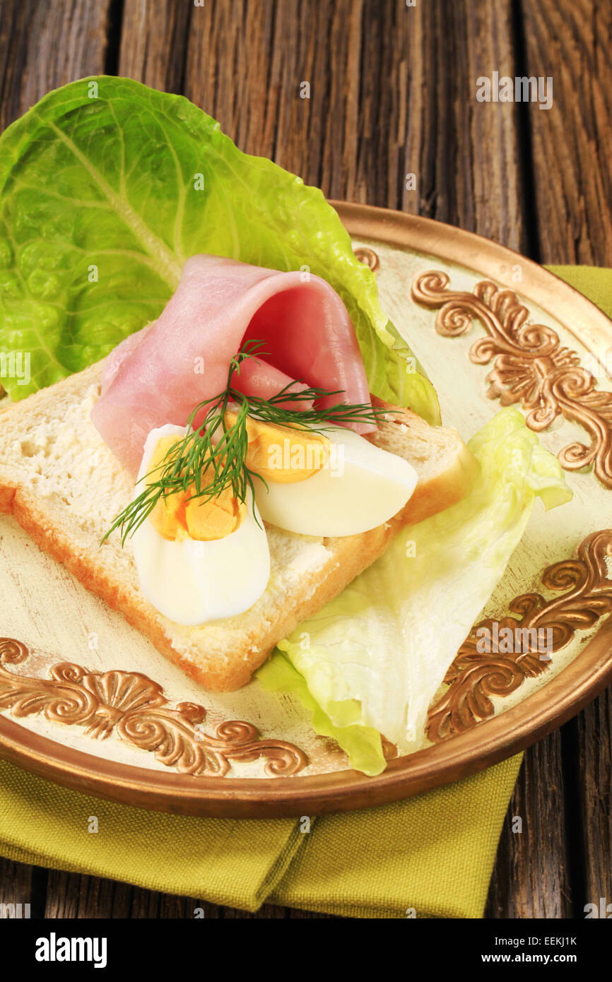 White bread with boiled egg and ham Stock Photo - Alamy