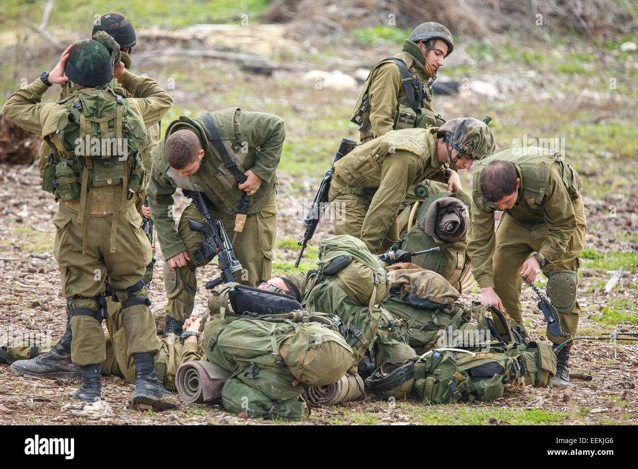 Golan Heights. 19th Jan, 2015. Israeli soldiers pack their gears near ...