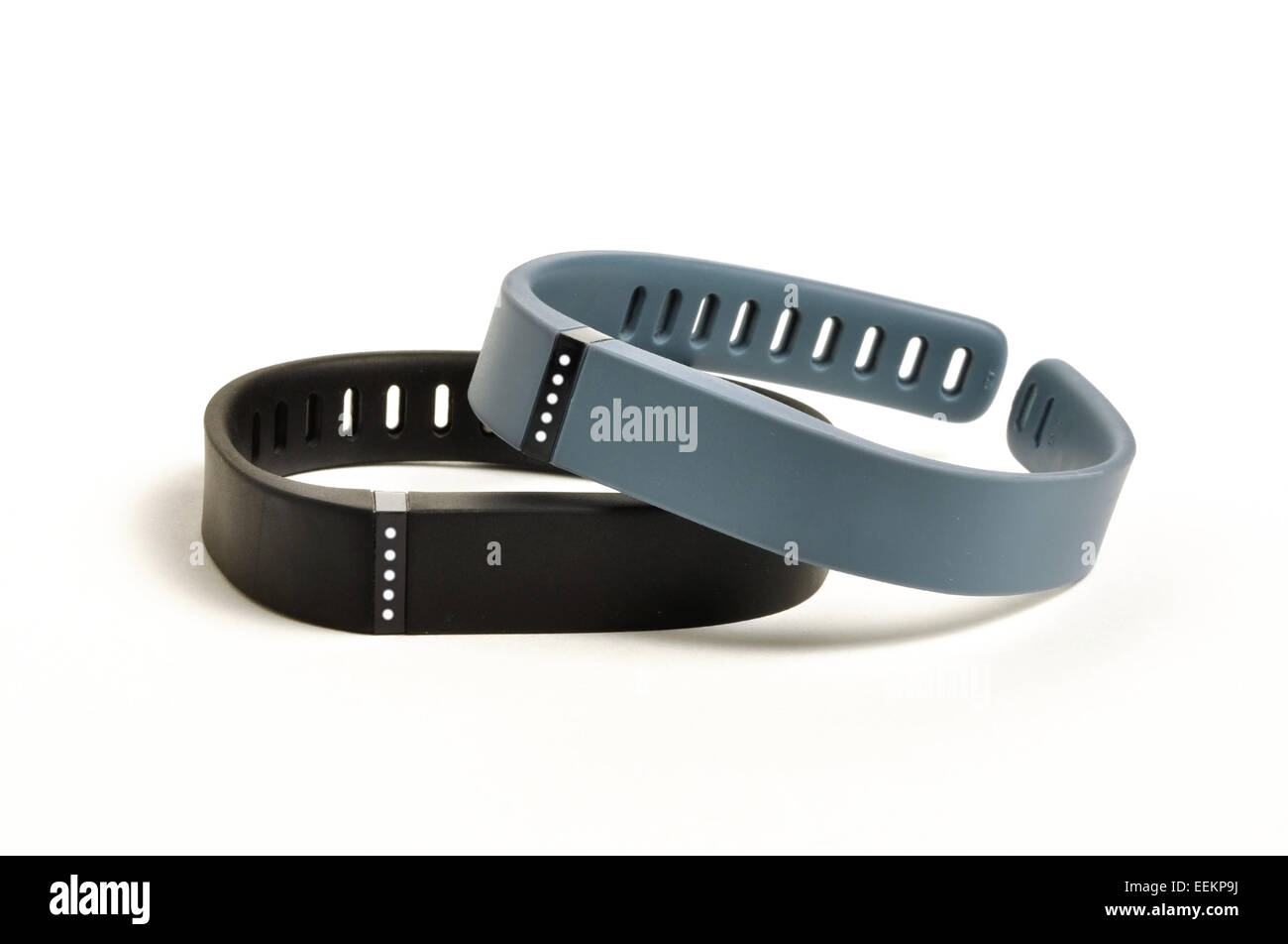 Activity fitness trackers on a white background Stock Photo - Alamy