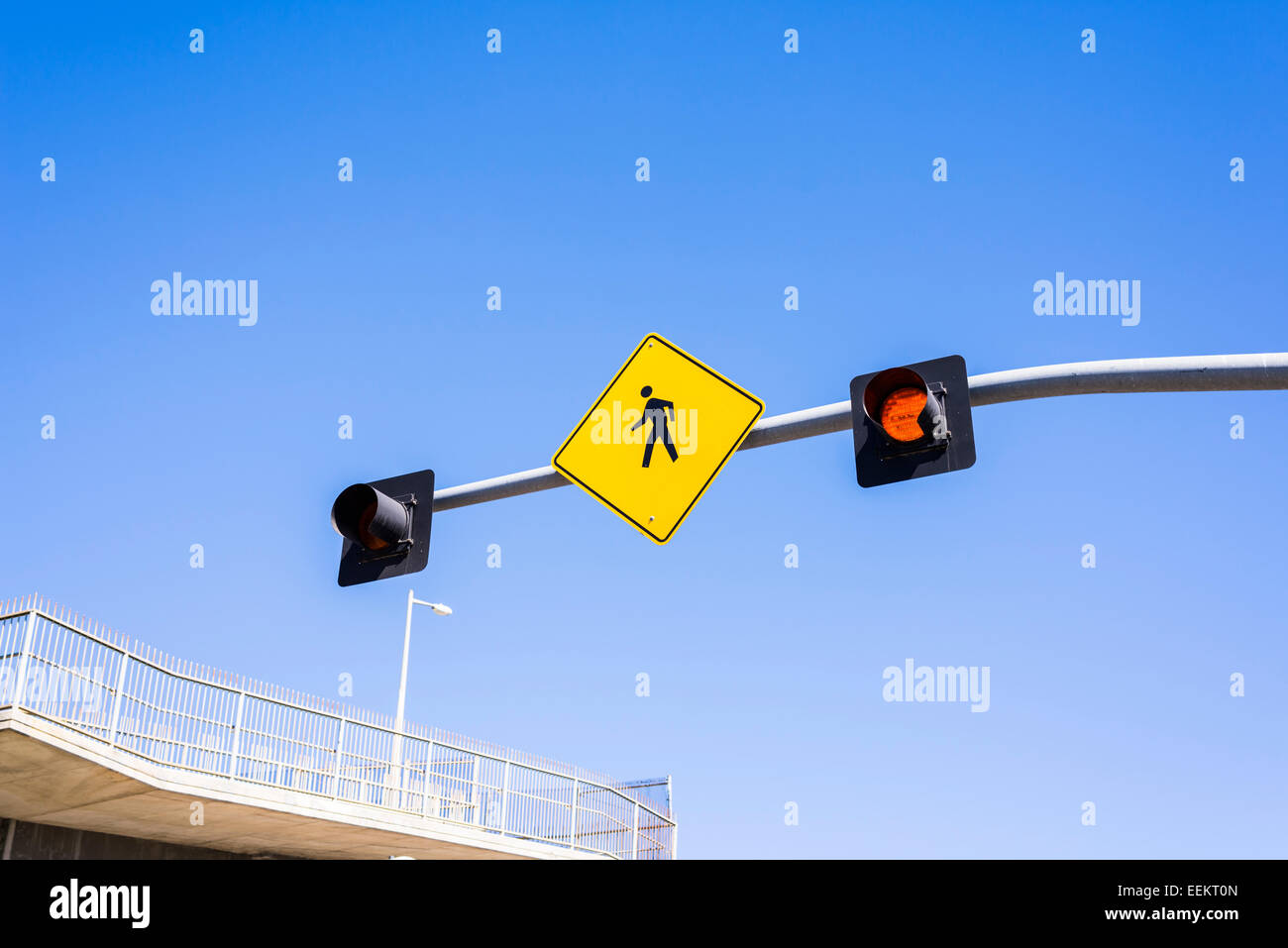 People walking street sign and warning traffic lights Stock Photo - Alamy