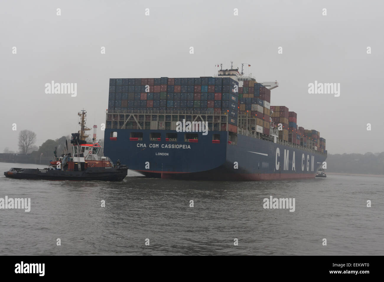 Tow boat assisting CMA CGM CASSIOPEIA container vessel out of the Port ...