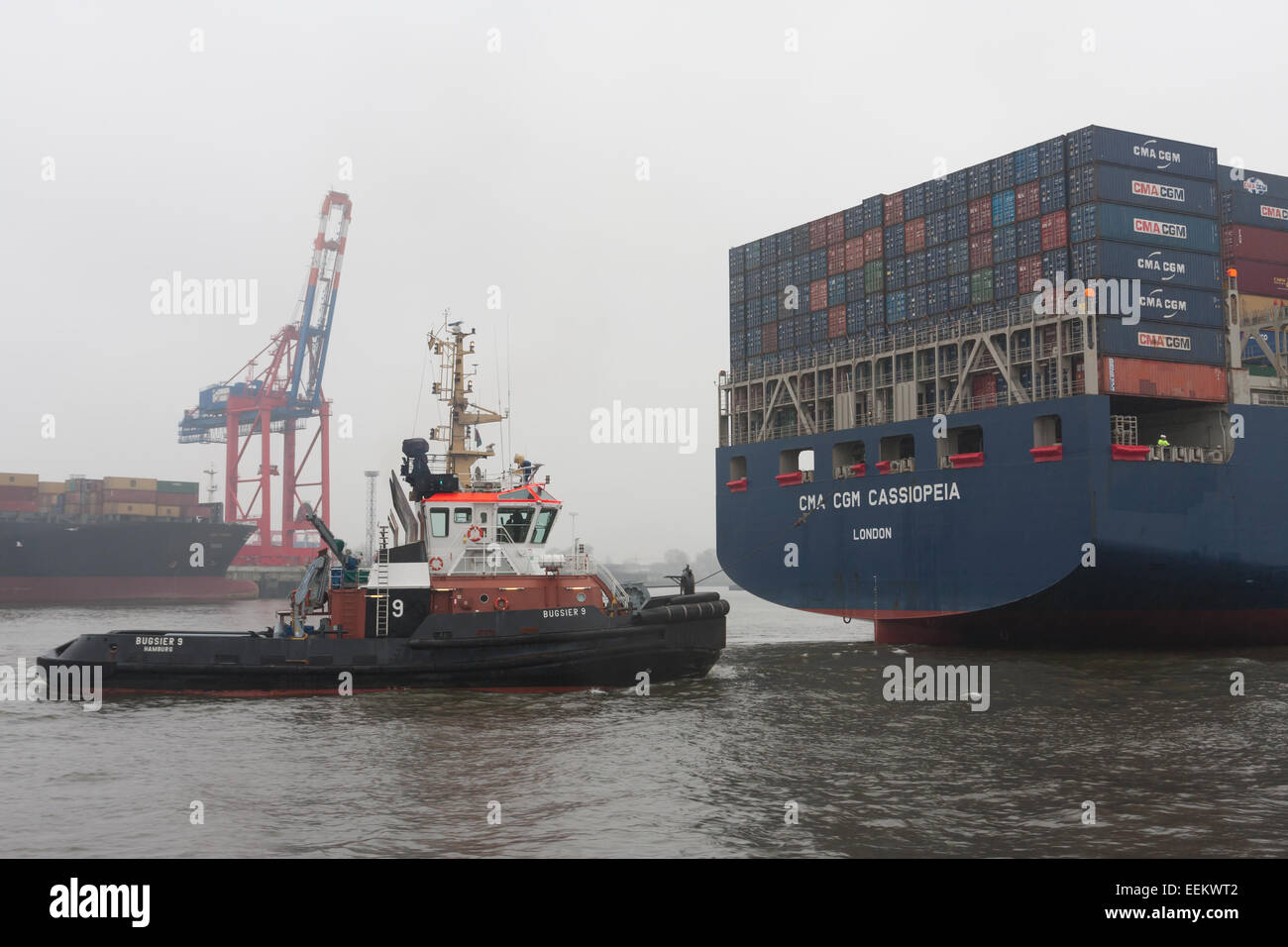 Tow boat assisting CMA CGM CASSIOPEIA container vessel out of the Port ...