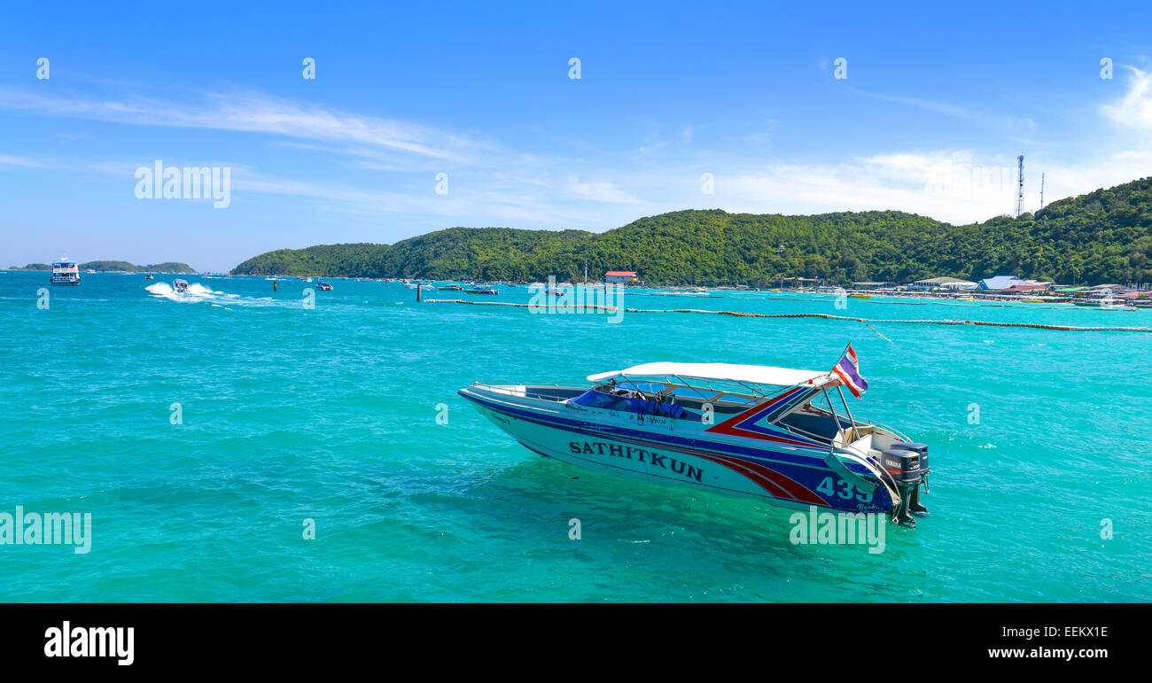 PATTAYA, THAILAND - DECEMBER 29 : Beautiful beach with motor boat at ...