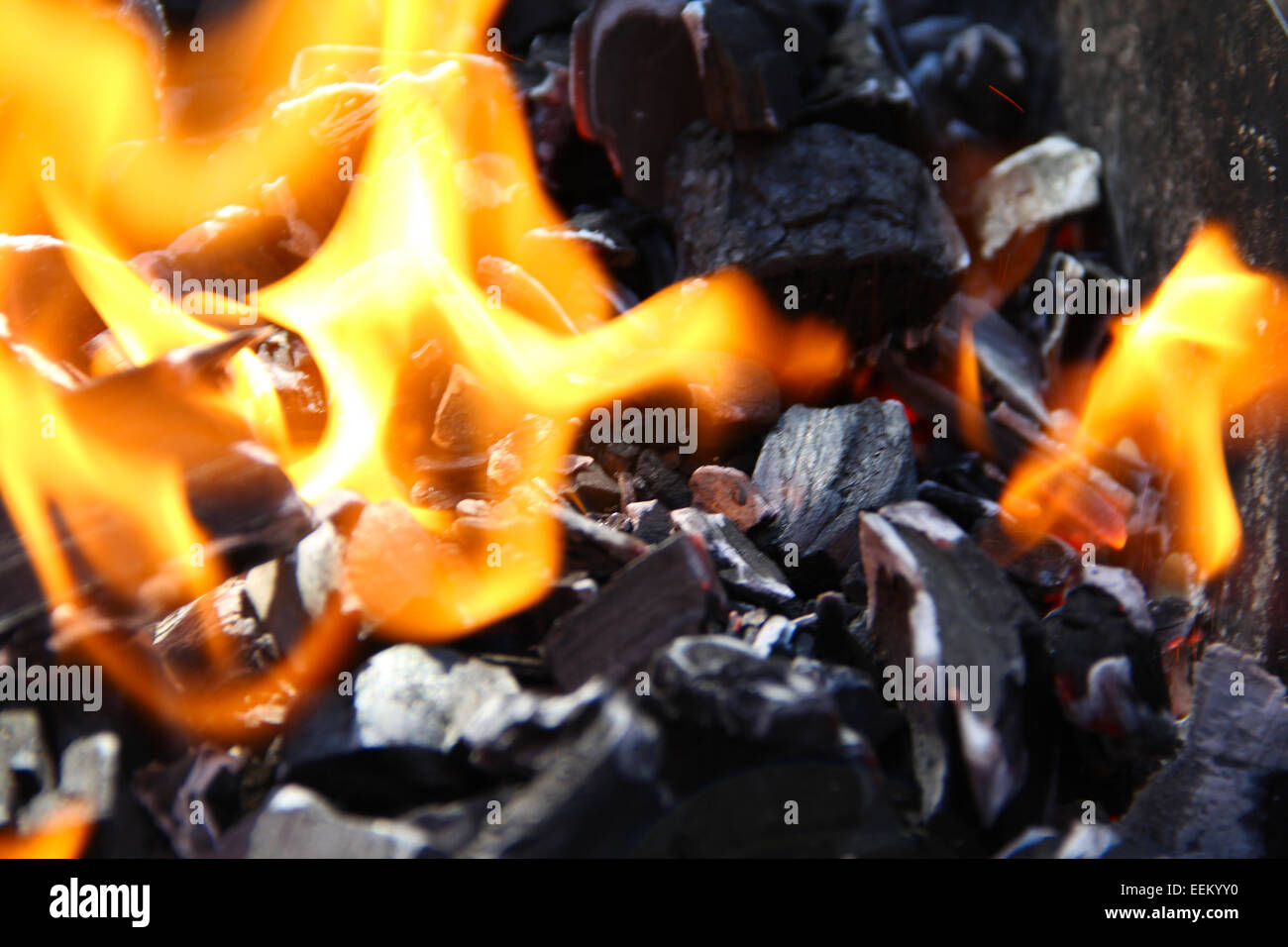 Beautiful fire on coal macro closeup Stock Photo - Alamy
