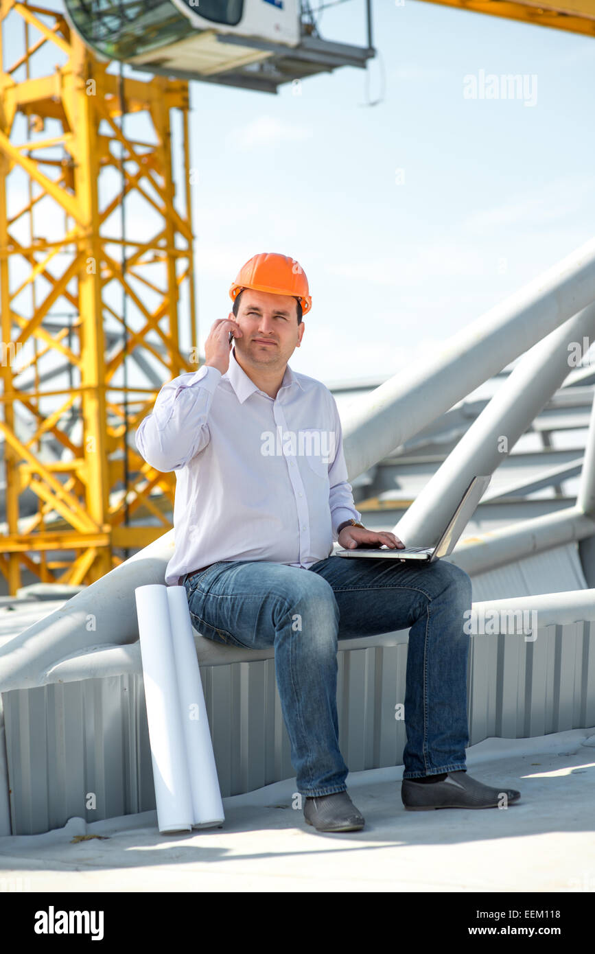 Foreman drawings supervising project hi-res stock photography and ...