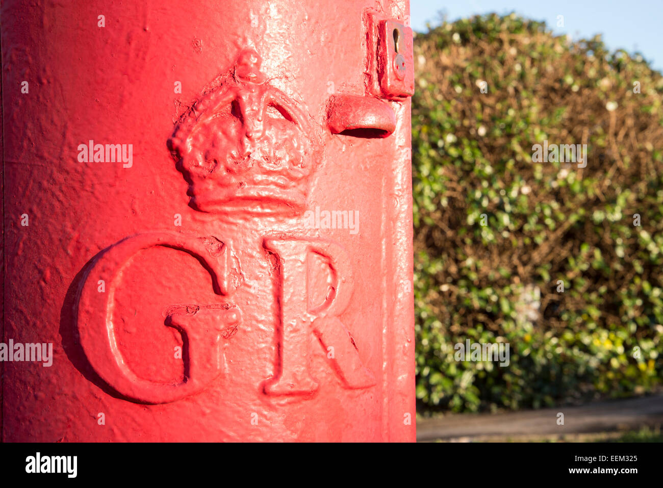 Close up of a George V monogram on a red post box outside Cheshunt ...