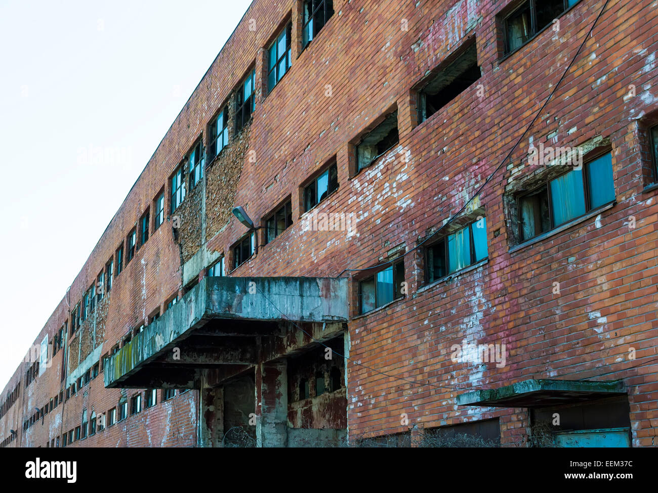 Abandoned production facility in a state of decay on an industrial ...