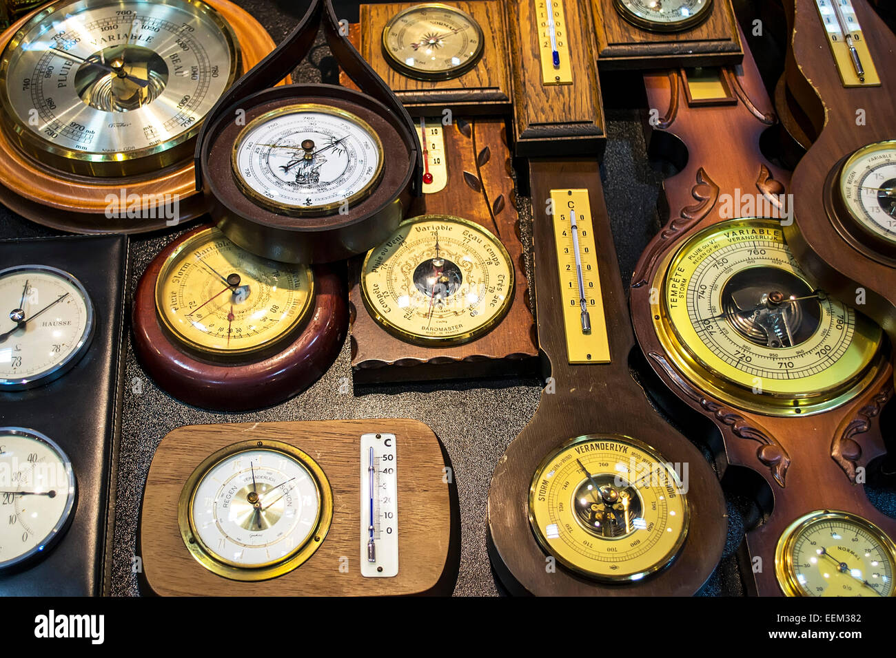 Various vintage barometers and thermometers exposed together Stock ...