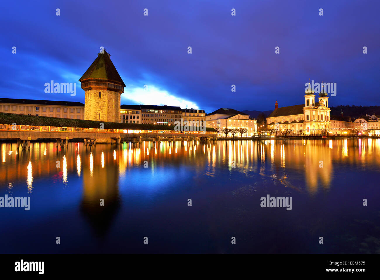 Chapel Bridge with a water tower and Jesuit Church on the Reuss River ...