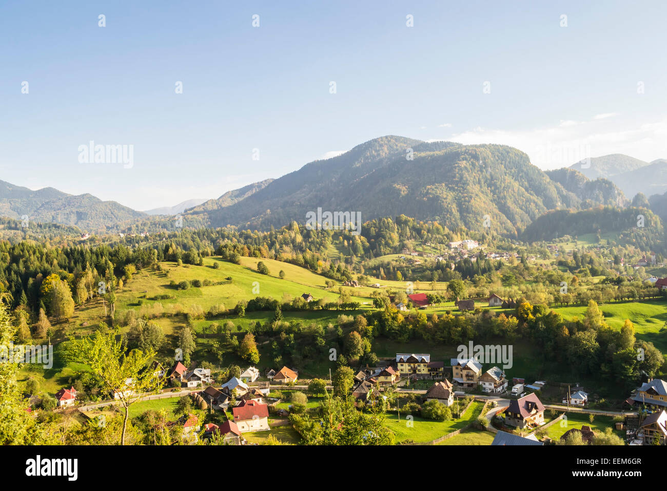 Alpine valley landscape with passage road between two mountain ranges ...