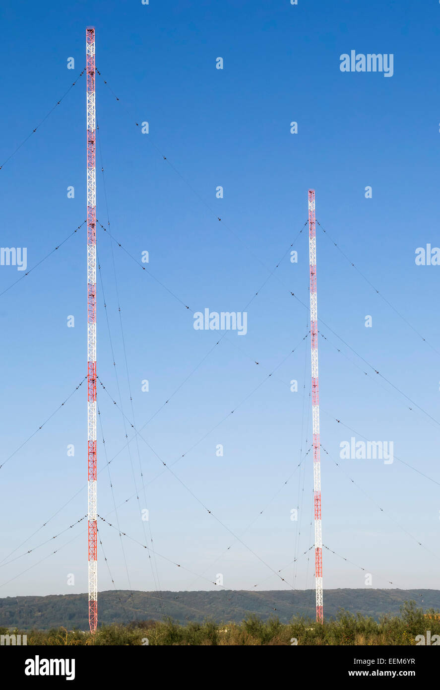 Two poles of a radio communication network receiving radio signal Stock ...
