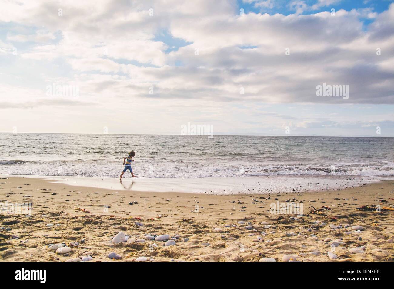 Boy 2 3 running on beach hi-res stock photography and images - Alamy
