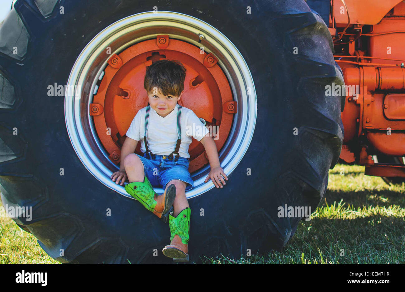 Child tractor tire hi-res stock photography and images - Alamy