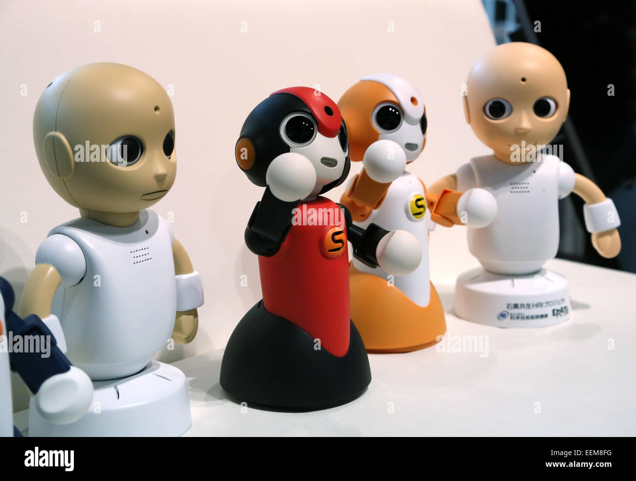 Tokyo, Japan. 20th Jan, 2015. Talking robots "Sota," center, and "CommU ...