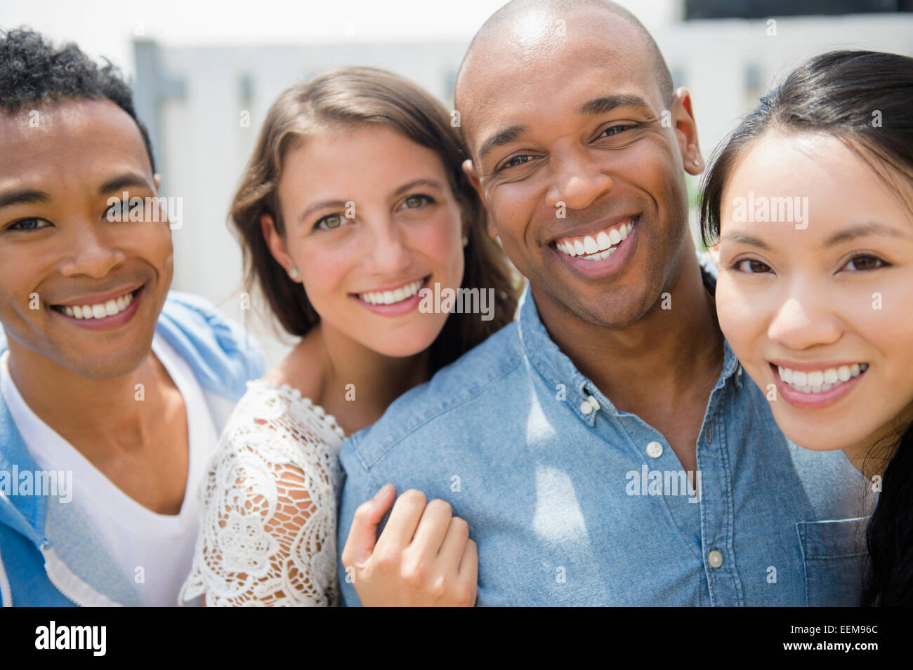Friends smiling at party Stock Photo - Alamy
