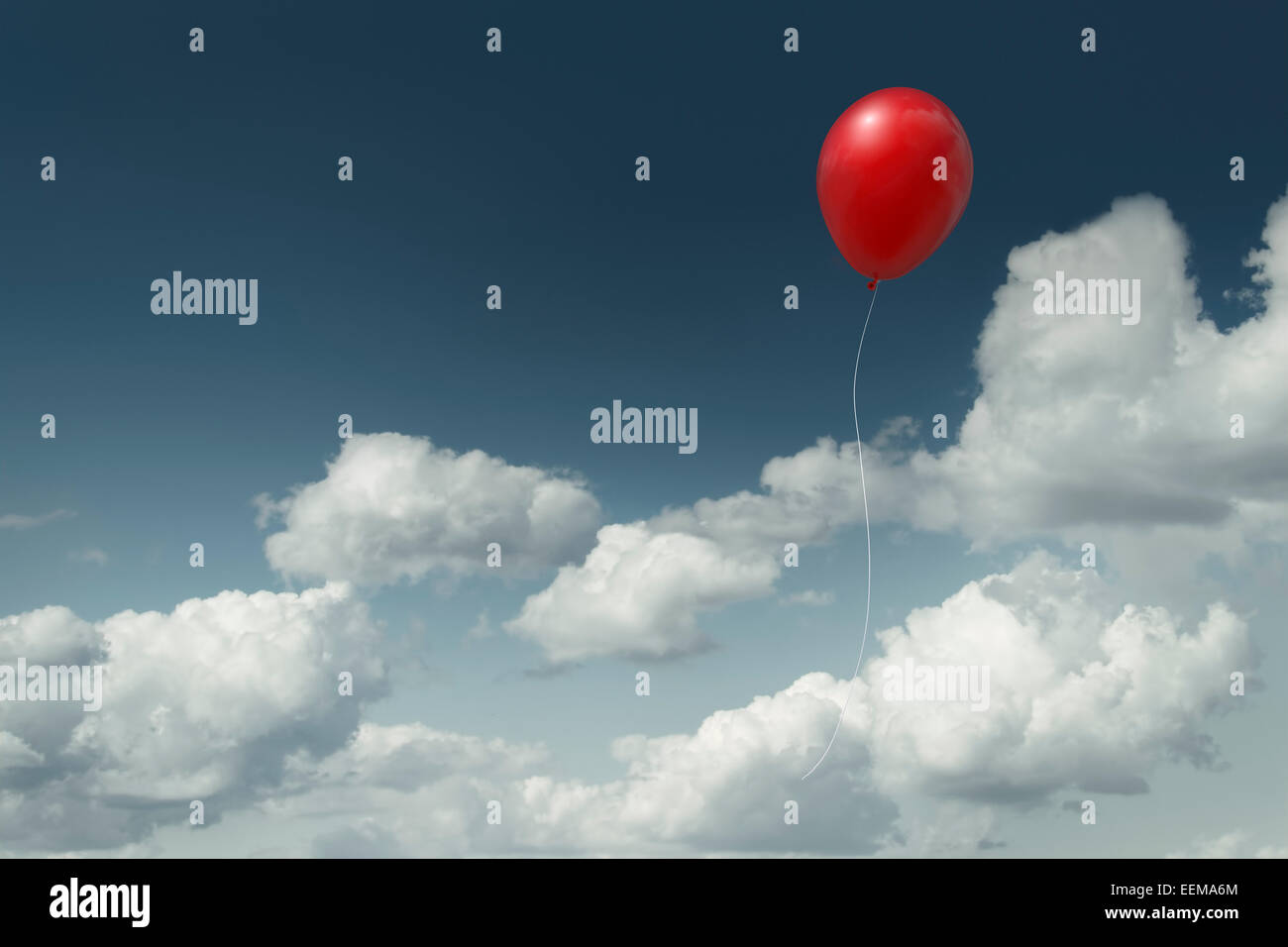 Red balloon floating in cloudy sky Stock Photo - Alamy