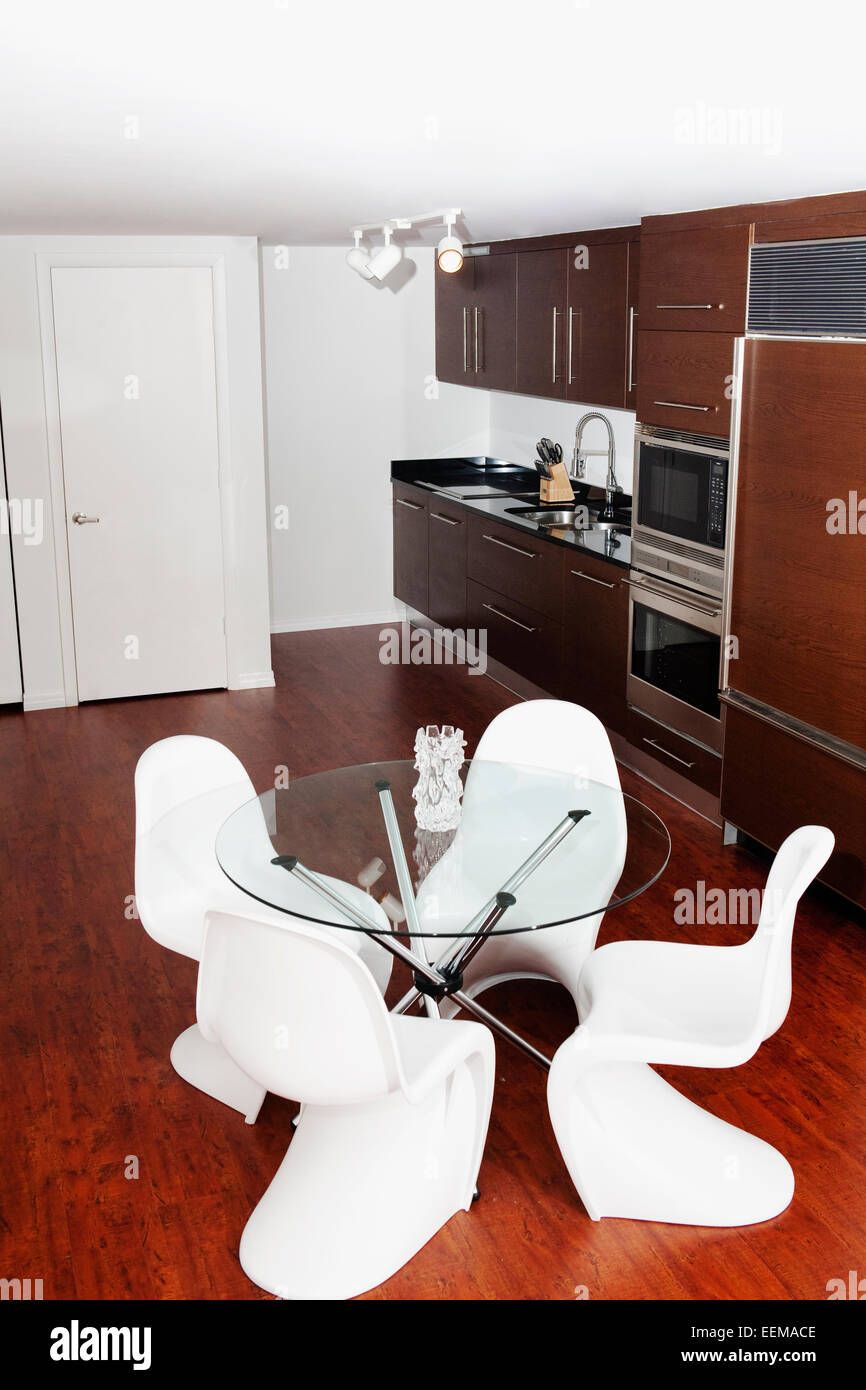 Table, counters and cabinets in modern kitchen Stock Photo - Alamy