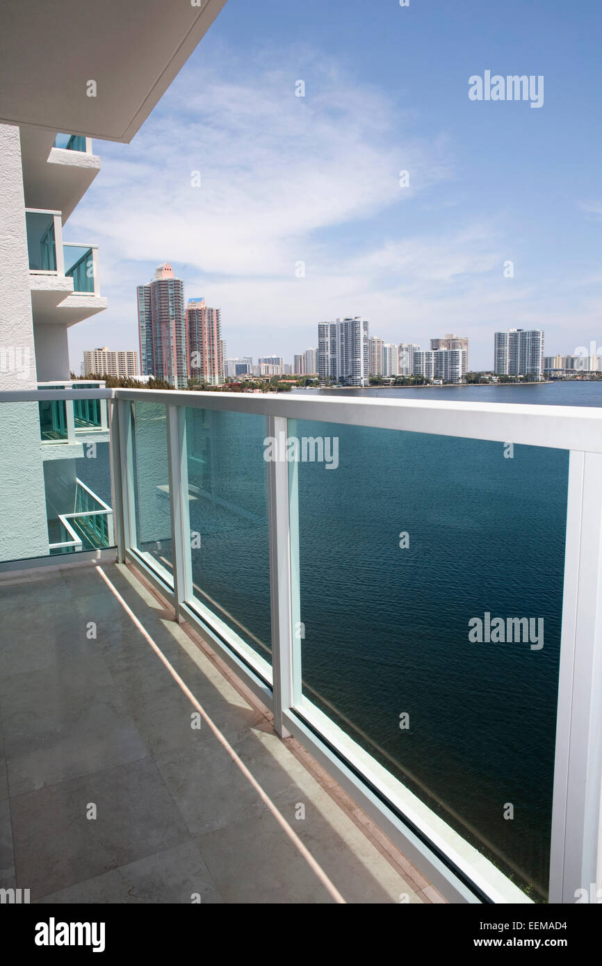 Balcony overlooking high rises in urban cityscape, Miami, Florida ...