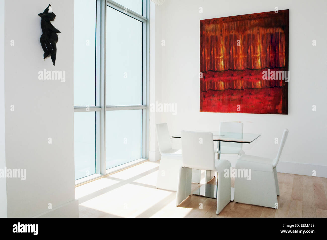 Table, chairs and windows in modern dining room Stock Photo - Alamy