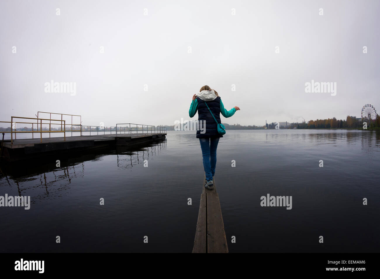 Woman balancing rear view hi-res stock photography and images - Alamy