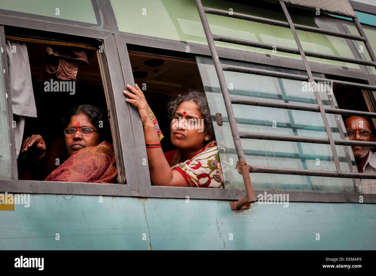Man in window of bus india hi-res stock photography and images - Alamy