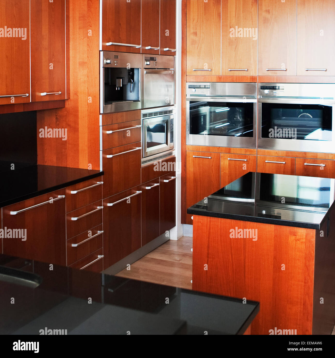 Cabinets, oven and counters in modern kitchen Stock Photo - Alamy