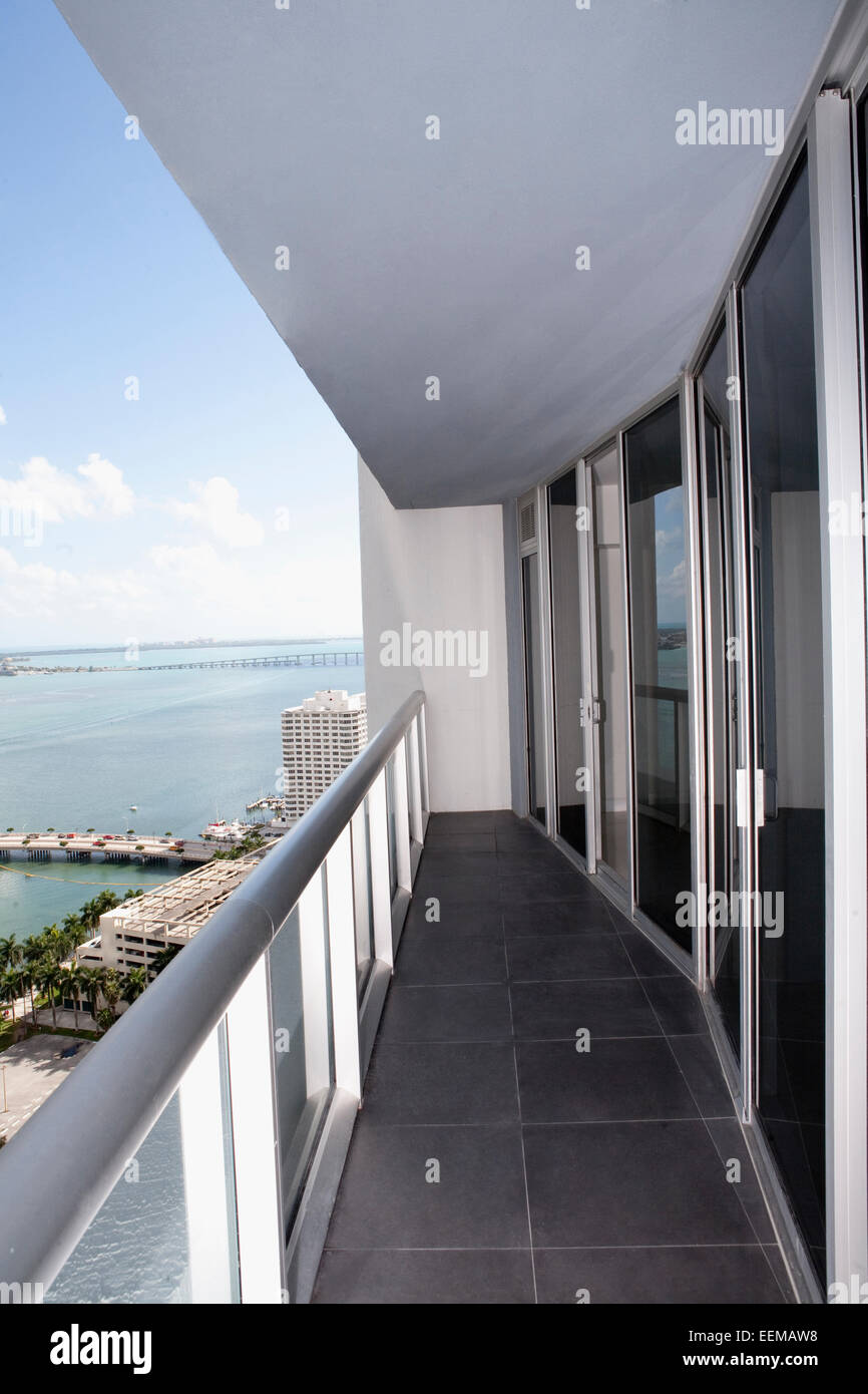 Balcony of modern apartment overlooking waterfront Stock Photo - Alamy